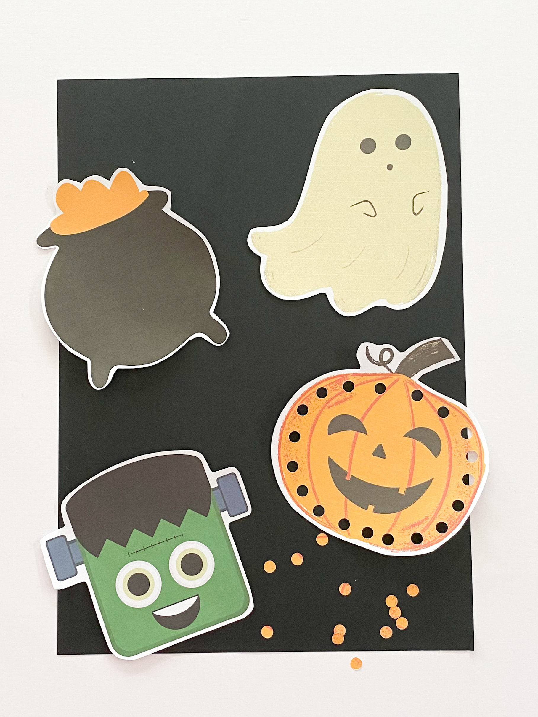 3. Grab a hole punch, and carefully make holes around the edge of each ...